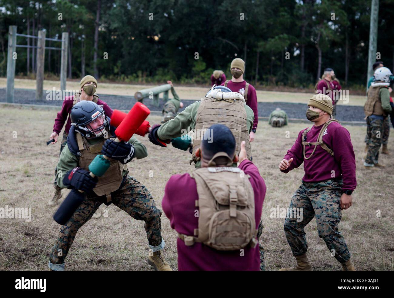 Recruits with Papa Company, 4th Recruit Training Battalion, conduct pugil sticks bouts aboard ...