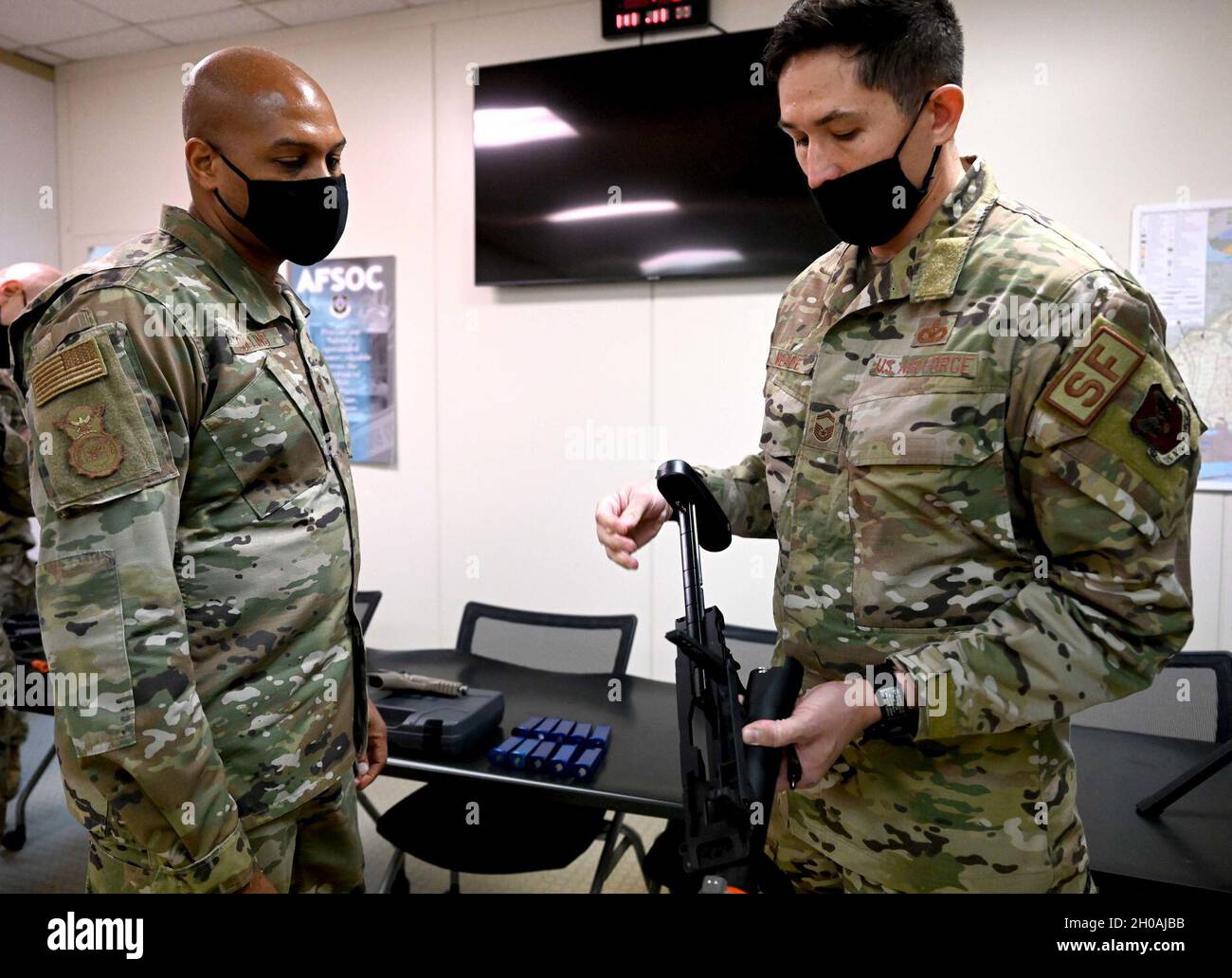 Brigadier General Roy Collins, left, director of Security Forces ...