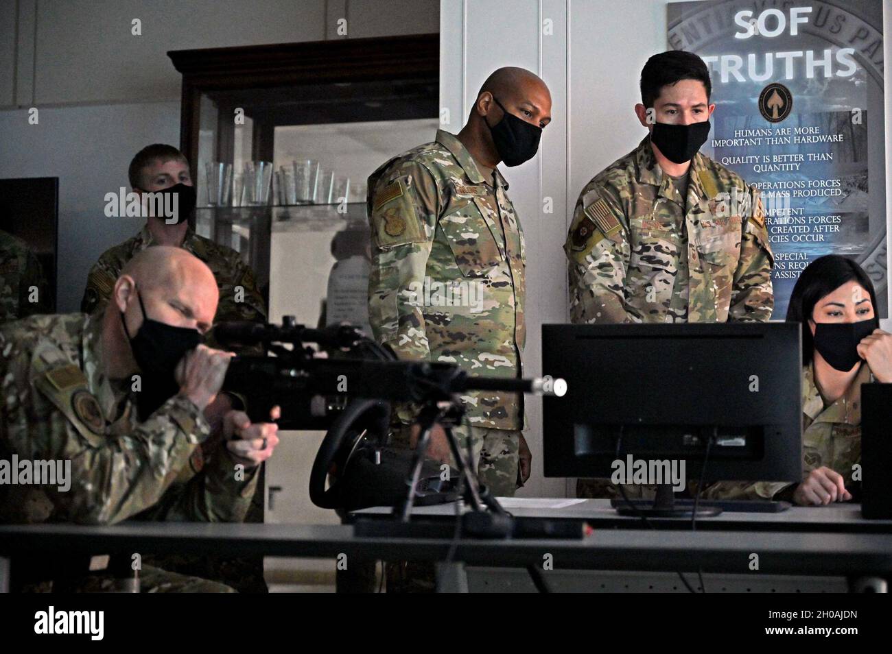 Brigadier General Roy Collins, center, director of Security Forces ...