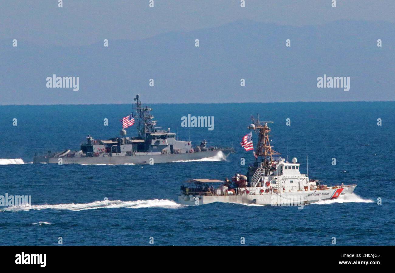 210111-N-IE405-2331 STRAIT OF HORMUZ (Jan. 11, 2021) The Coast Guard patrol boat USCGC Aquidneck ...