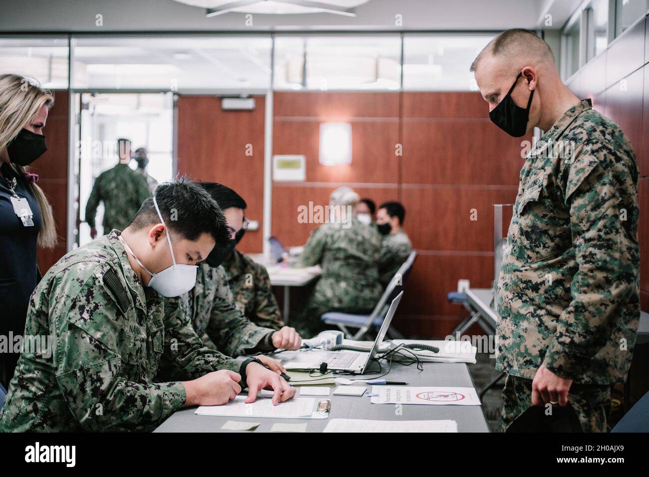 U.S. Marine Corps Col. James Lively, right, the commanding officer of ...