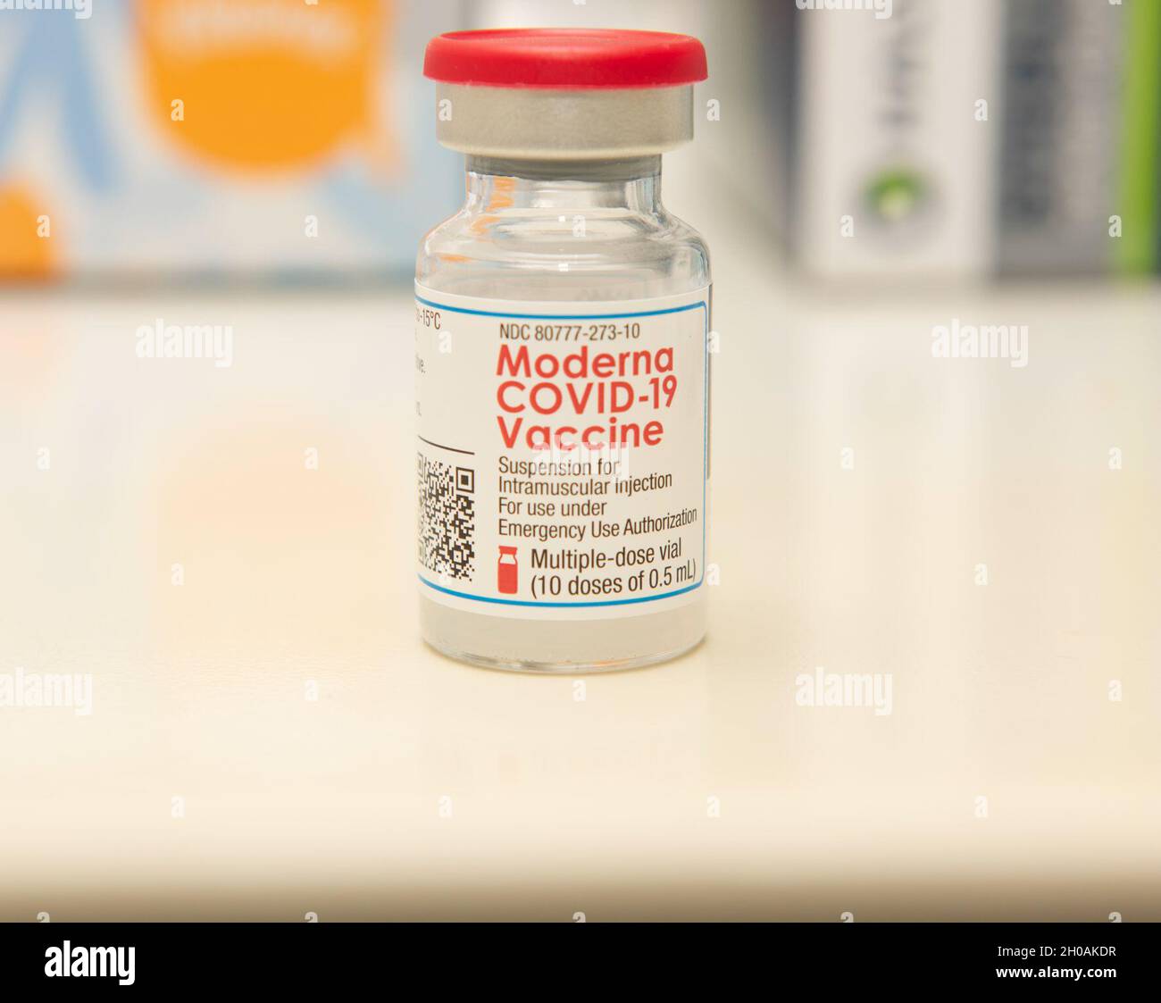 A Moderna COVID-19 vaccine vial is shown before distribution at ...
