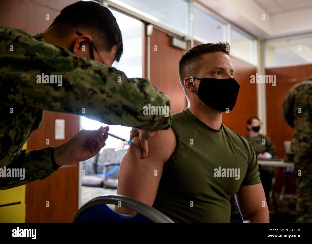 U.S. Marine Capt. Michael Cathey, the aide-de-camp for the commanding ...