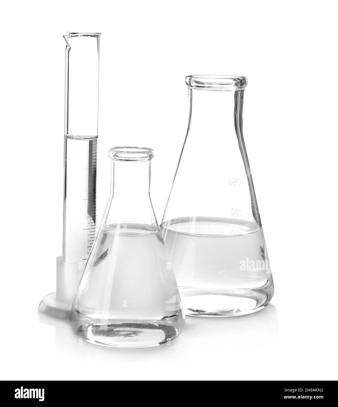 Flasks with liquid on white background. Laboratory analysis equipment ...