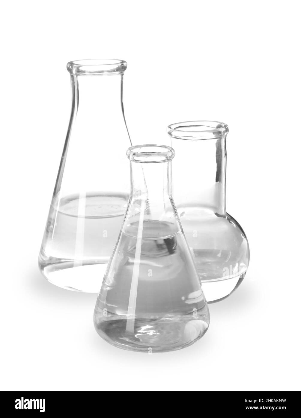 Flasks with liquid on white background. Laboratory analysis equipment ...