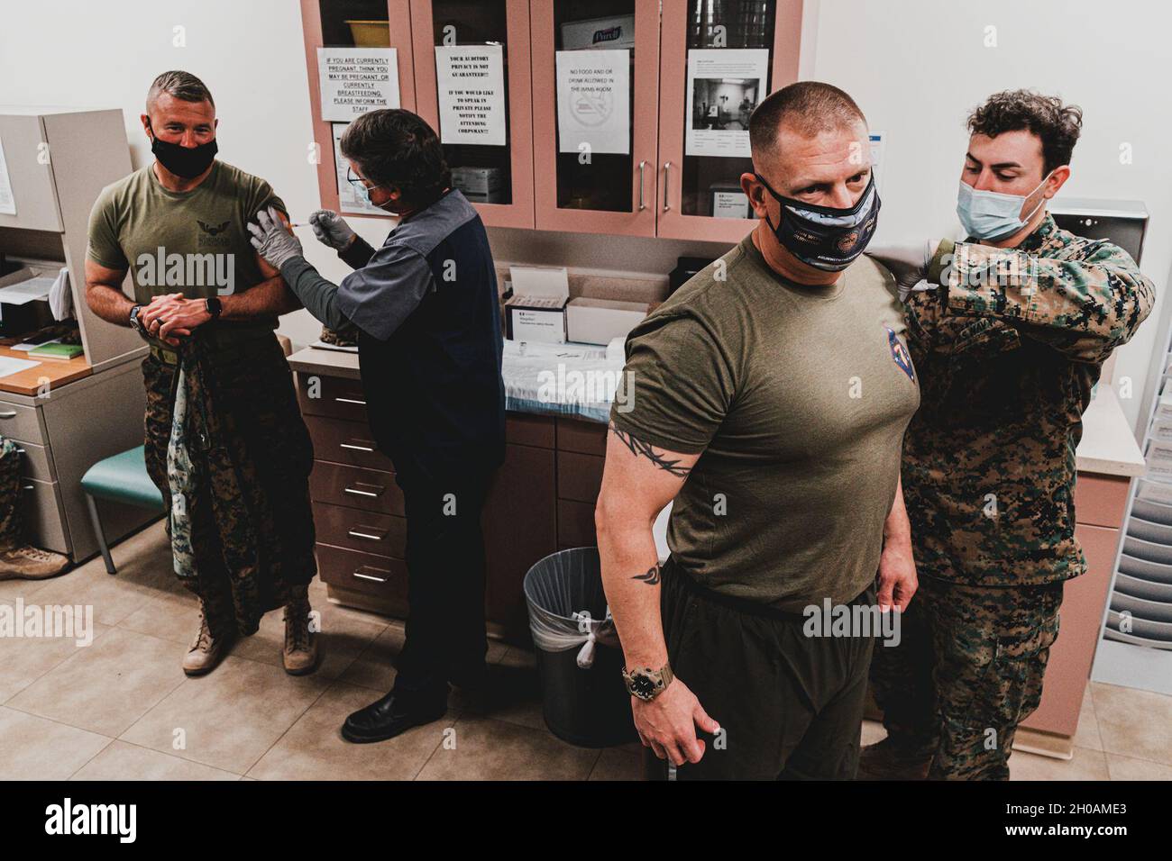 U.S. Marine Corps Col. Matthew T. Good (left), commanding officer, and ...