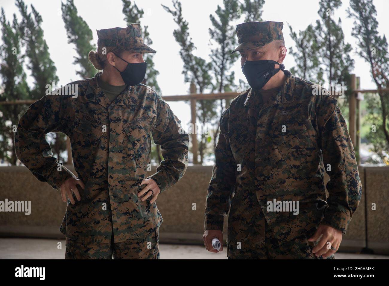 U.S. Marine Corps Sgt. Maj. Joy M. Kitashima, left, Marine Corps ...