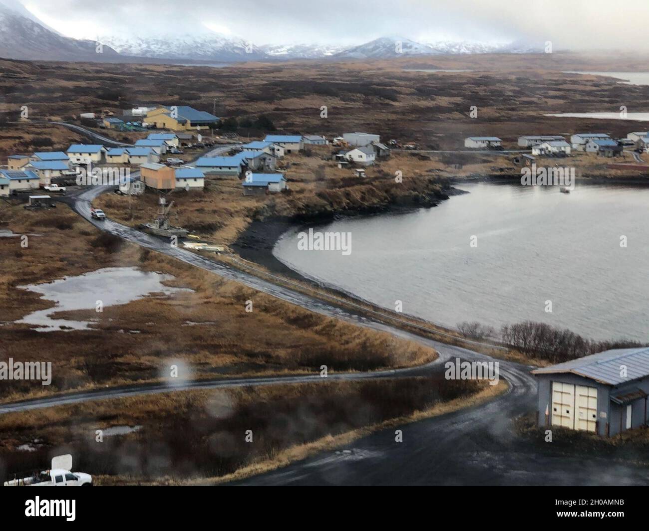 A Coast Guard Air Station Kodiak MH-60 Jayhawk helicopter crew approach ...