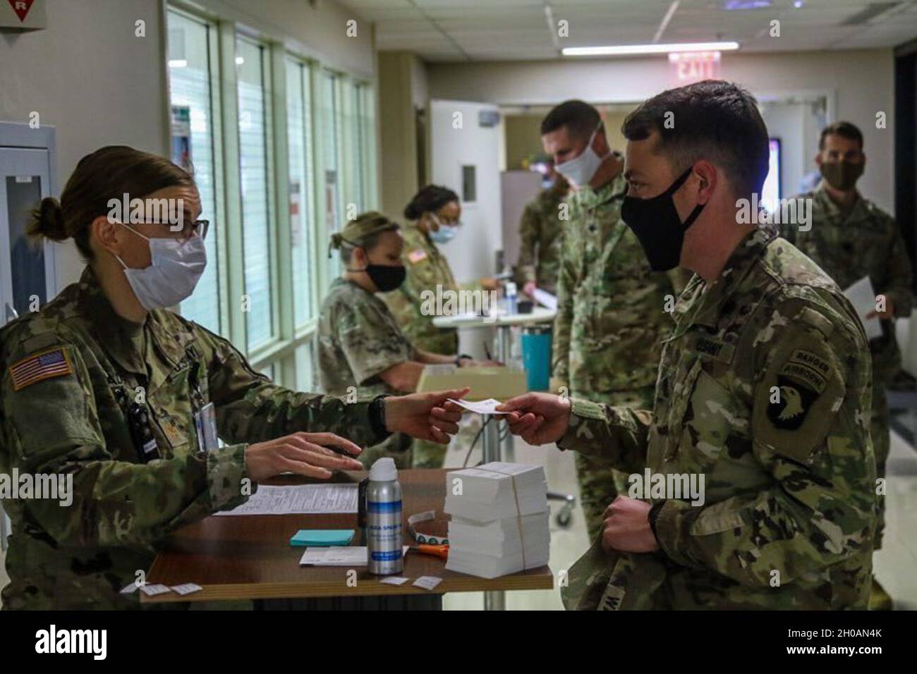 U.S. Army Maj. Jade Snader, left, chief nurse for Soldier Health ...