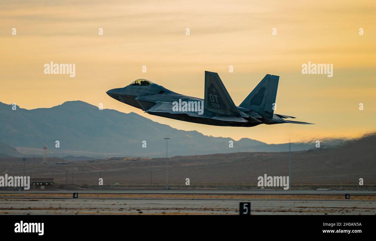 An F-22 Raptor fighter jet assigned to the 422nd Test and Evaluation ...