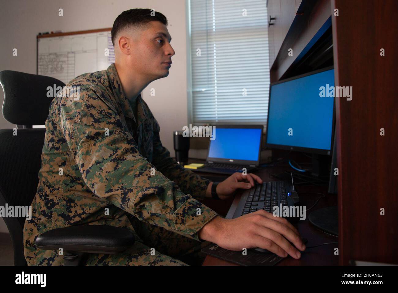 U.S. Marine Corps Cpl. Gilbert A. Barrett IV, a senior analyst and ...