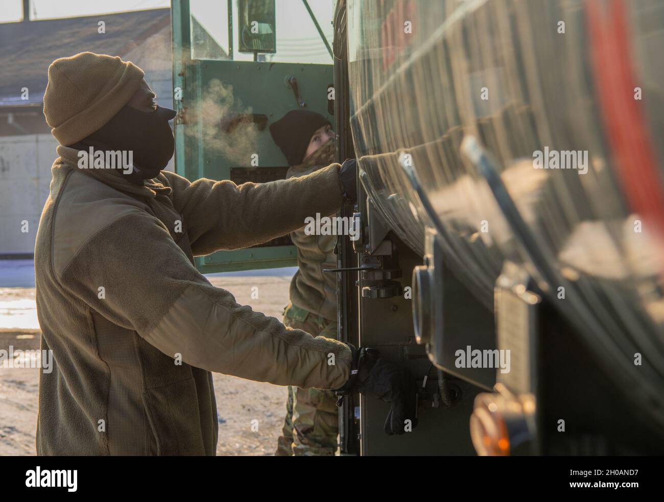 Senior Airman Keith McGee (left), 51st Logistics Readiness Squadron ...