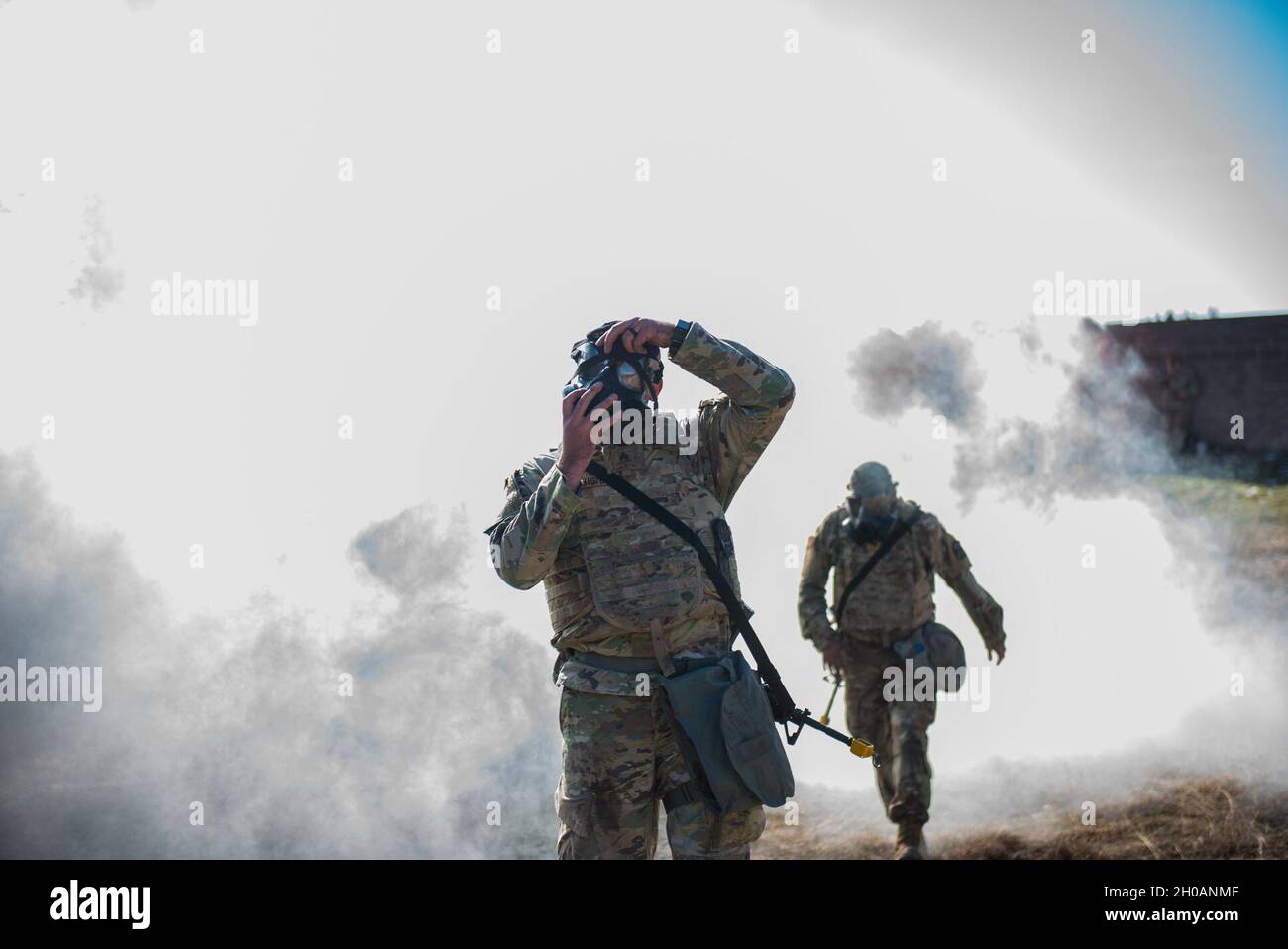 Sgt. Tyler Bisio from 61st Multifunctional Medical Battalion, dons his ...