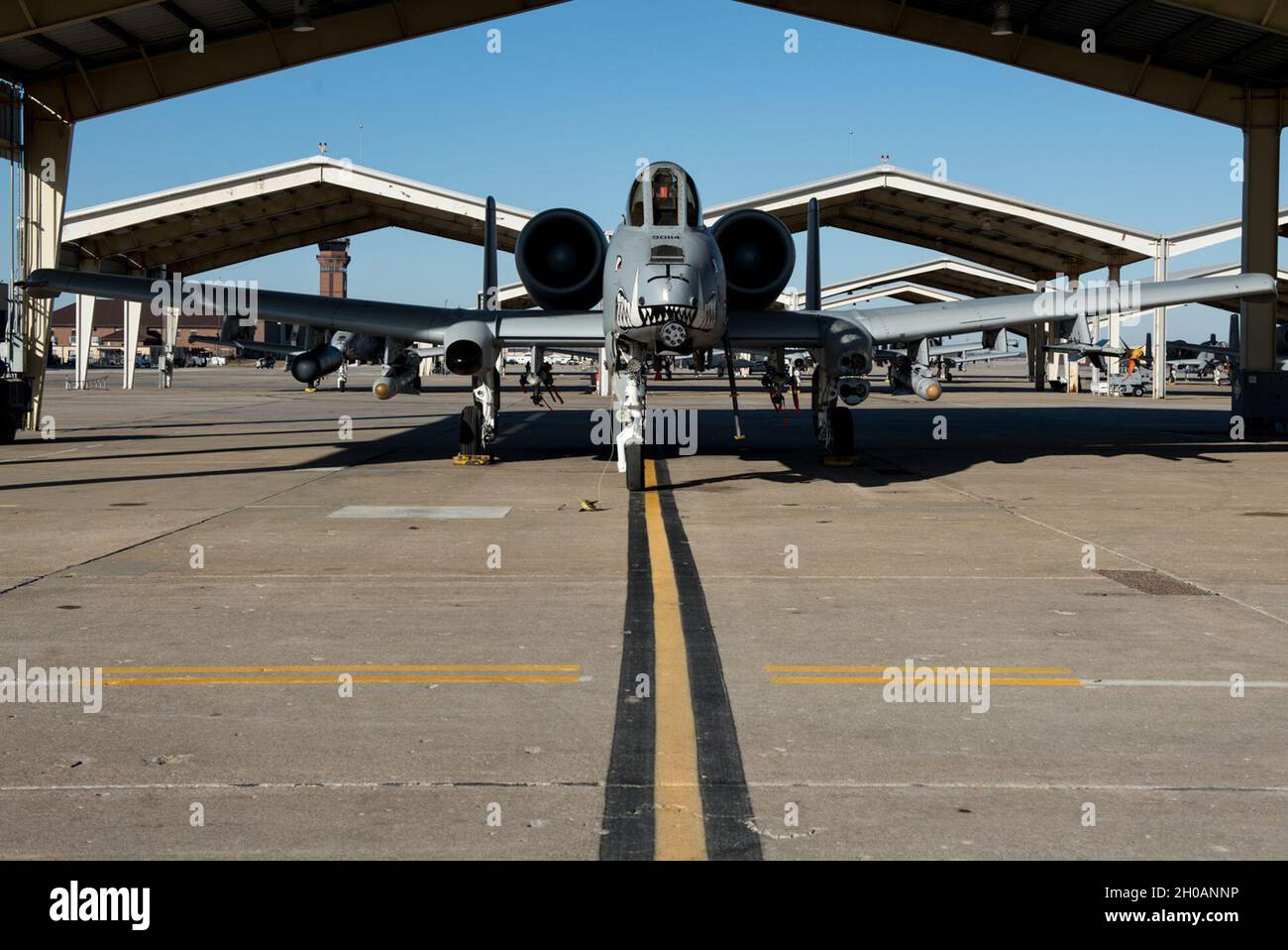 An A-10 Thunderbolt II sits under the hardstand at Whiteman Air Force ...