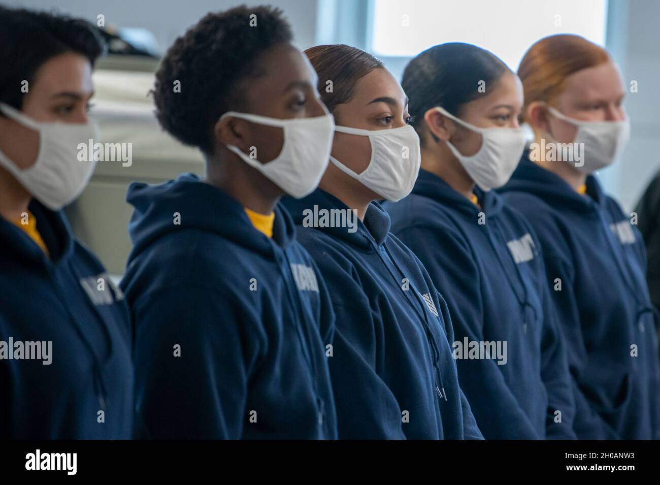 Recruits listen to instructions from a recruit division commander ...