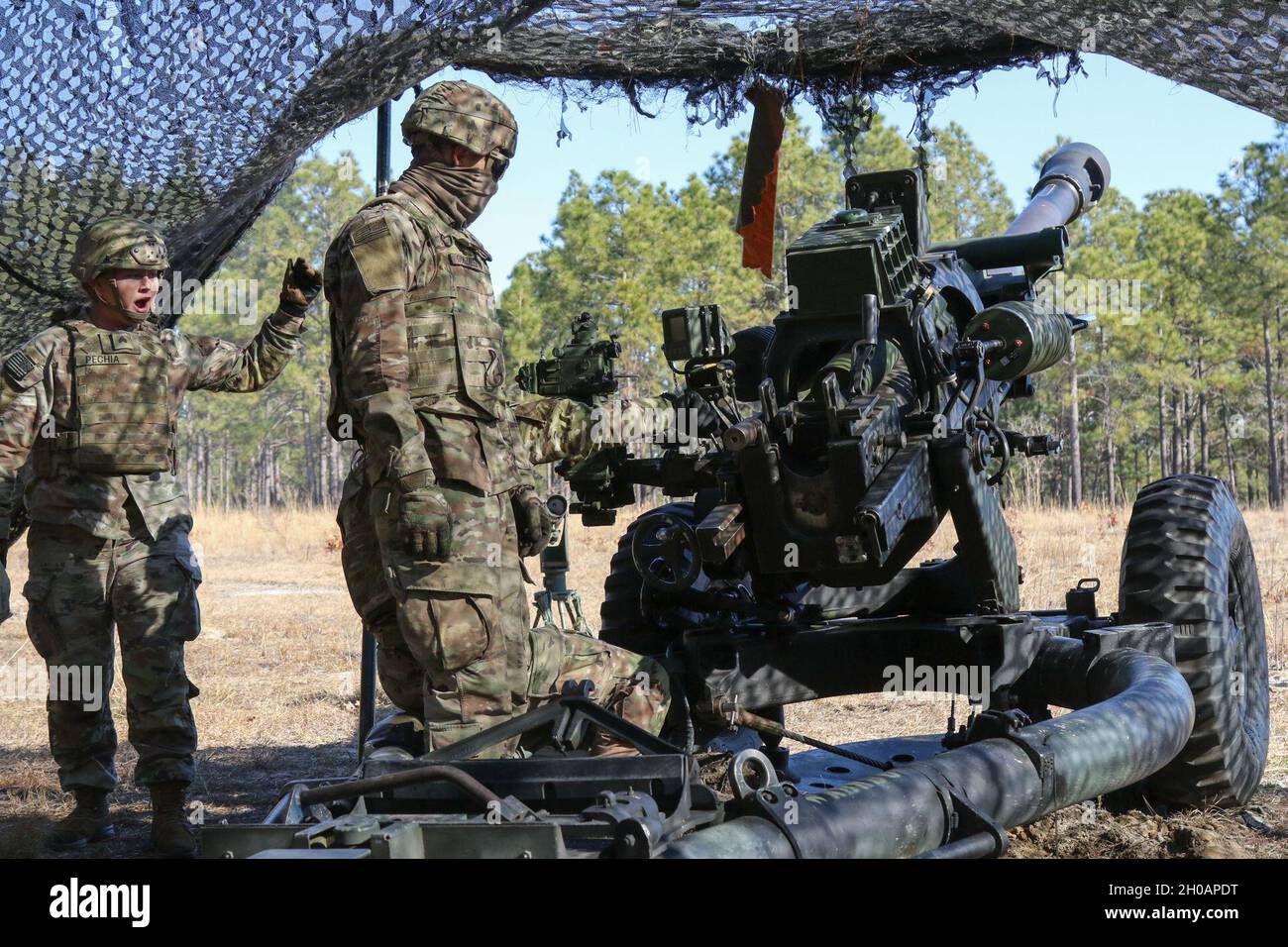 A U.S. Army Paratrooper assigned to 2nd Battalion, 319th Airborne Field Artillery Regiment, 2nd ...