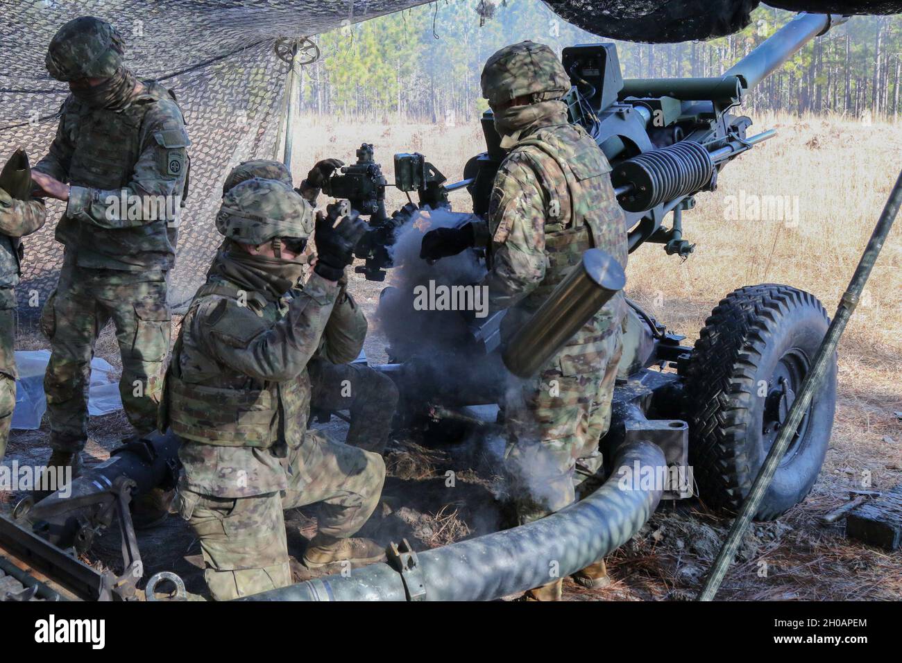 A U.S. Army Paratrooper assigned to 2nd Battalion, 319th Airborne Field Artillery Regiment, 2nd ...