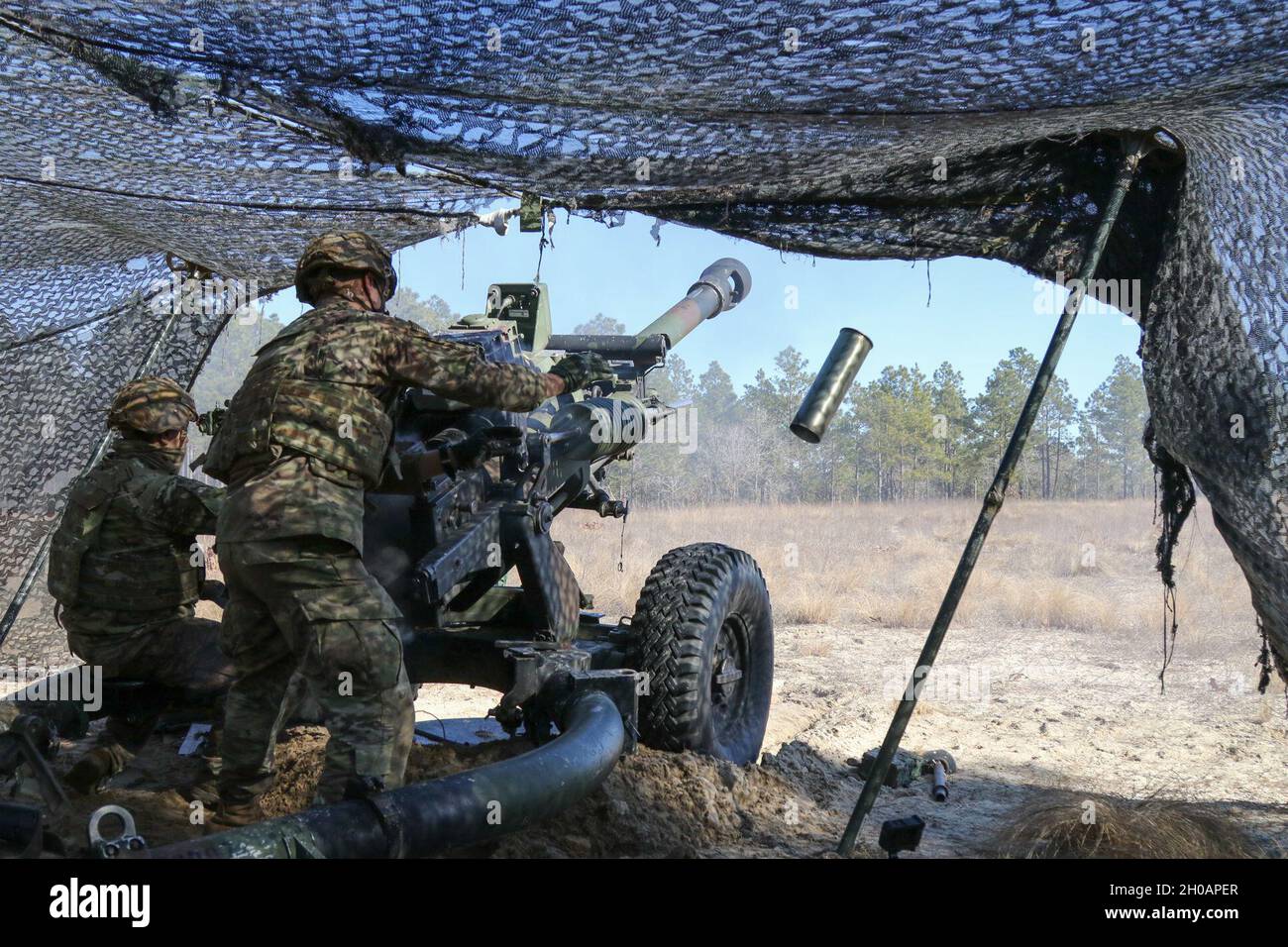 A U.S. Army Paratrooper assigned to 2nd Battalion, 319th Airborne Field Artillery Regiment, 2nd ...