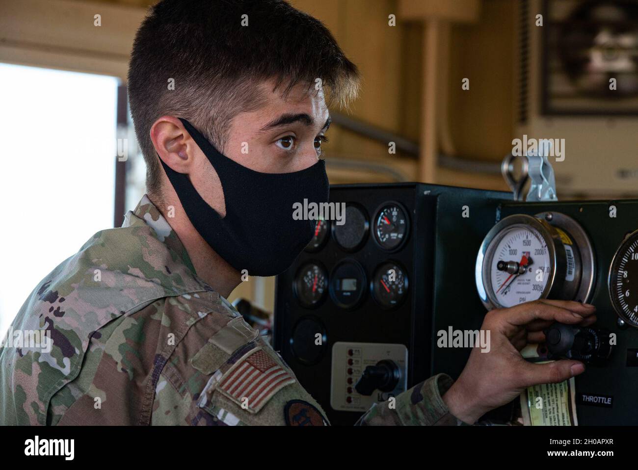 Airman Eric Christenson, 374th Civil Engineer Squadron electrical power ...