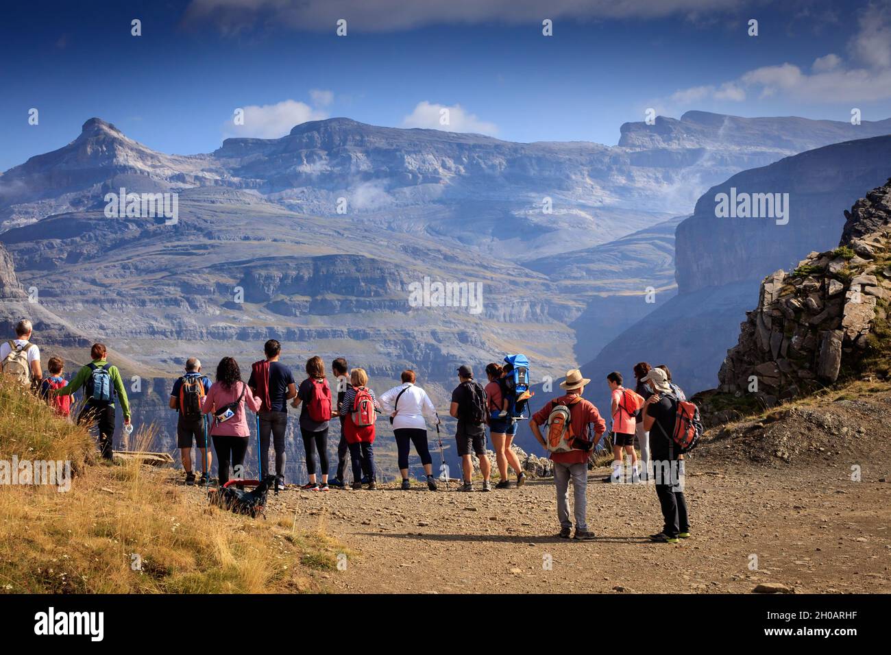Hikers take a look at the canyon from one observatory in the Ordesa ...