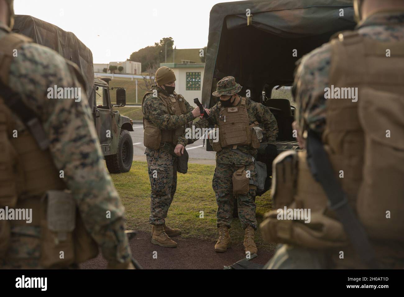 U.S. Navy Sailor Petty Officer 2nd Class William Ferrier, left, a ...