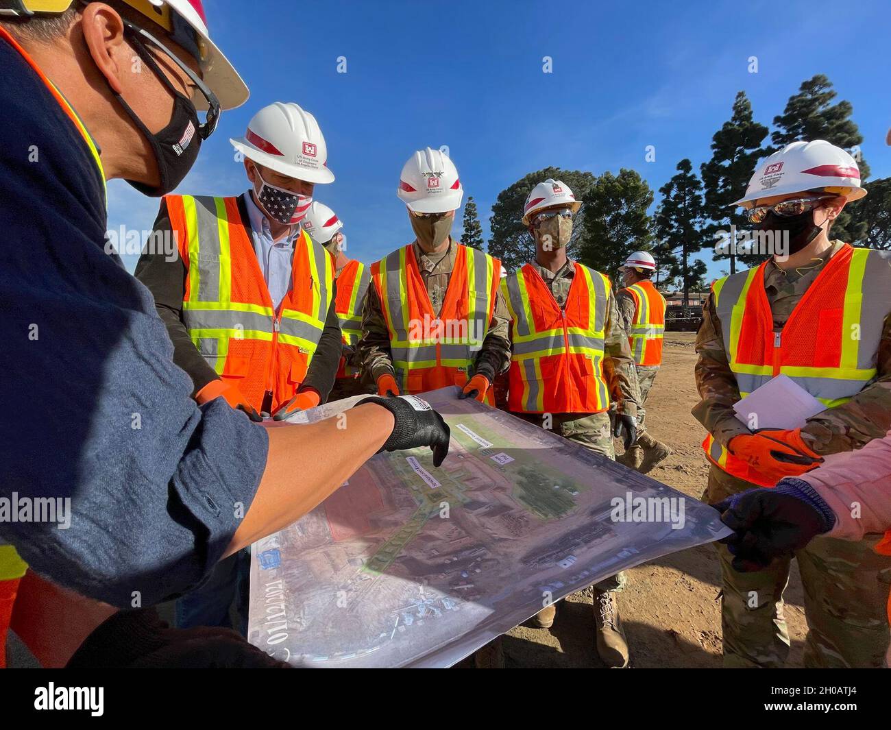 Ivan Caceres, left, quality assurance and construction control ...