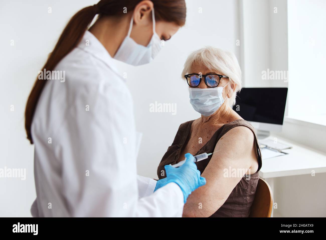 female doctor immunization safety immunity protection Stock Photo - Alamy