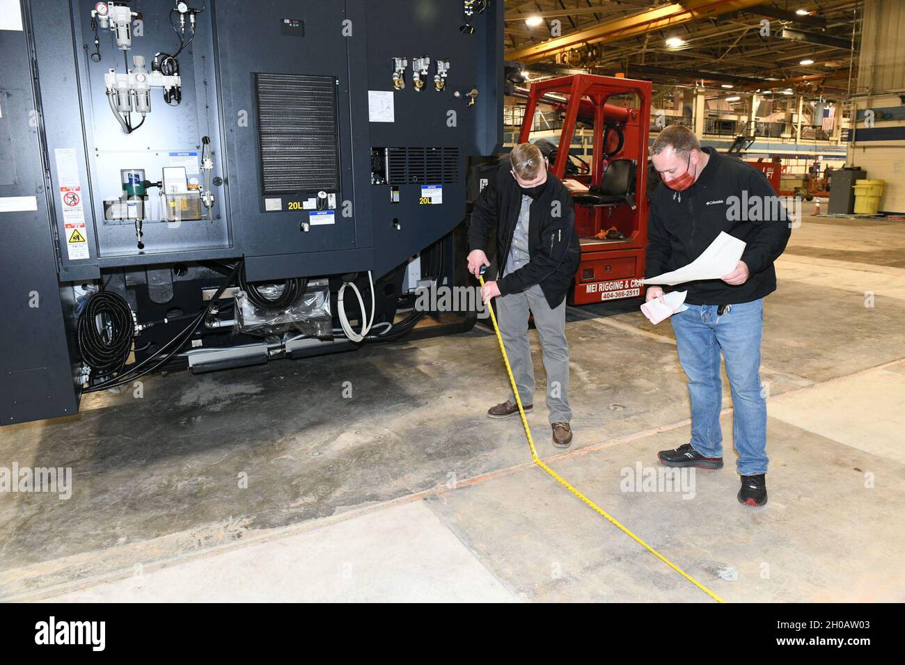 Scott Mayfield, right, and Micah Graves, left, both 402nd Commodities ...