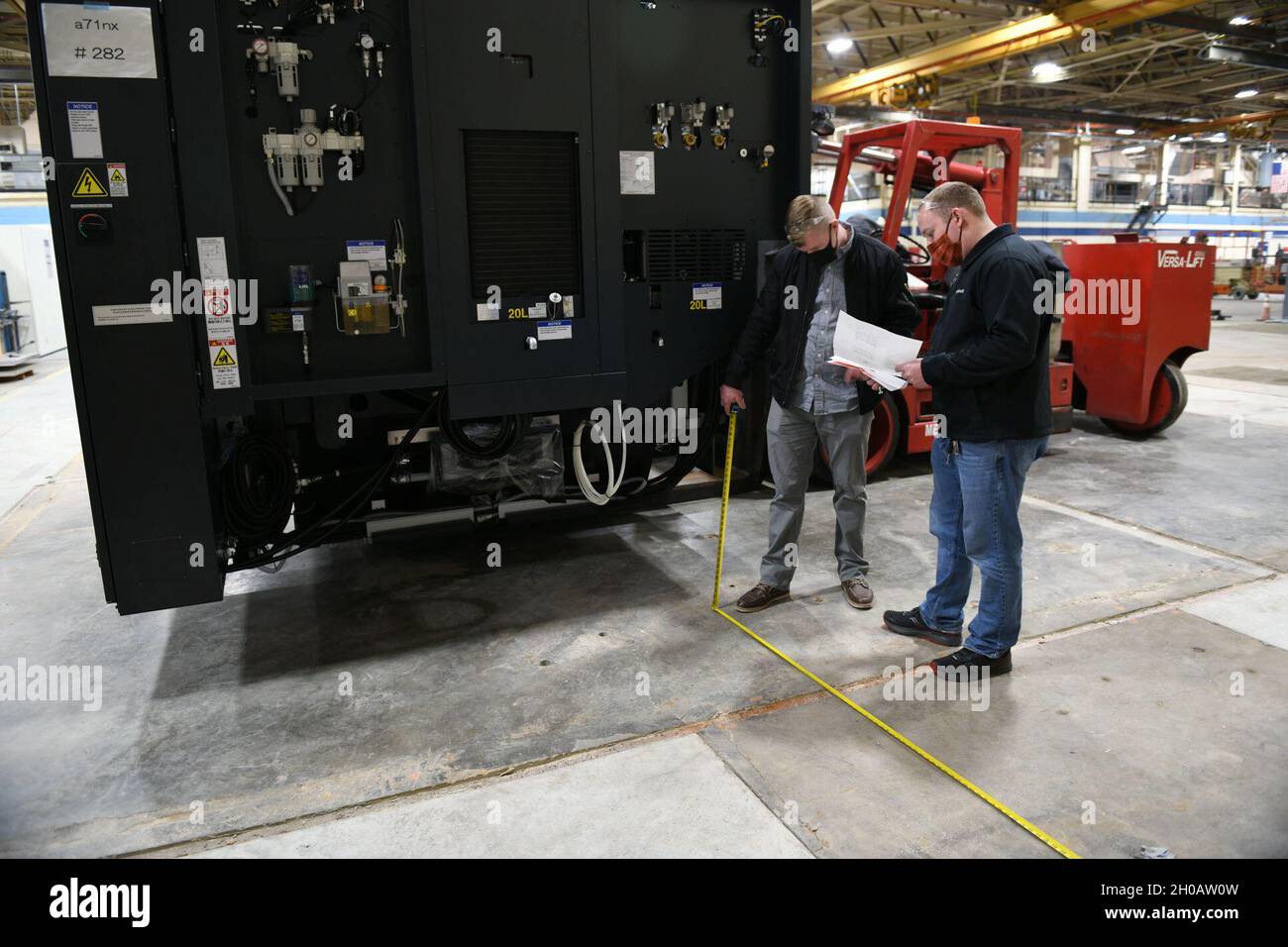 Scott Mayfield, right, and Micah Graves, left, both 402nd Commodities ...
