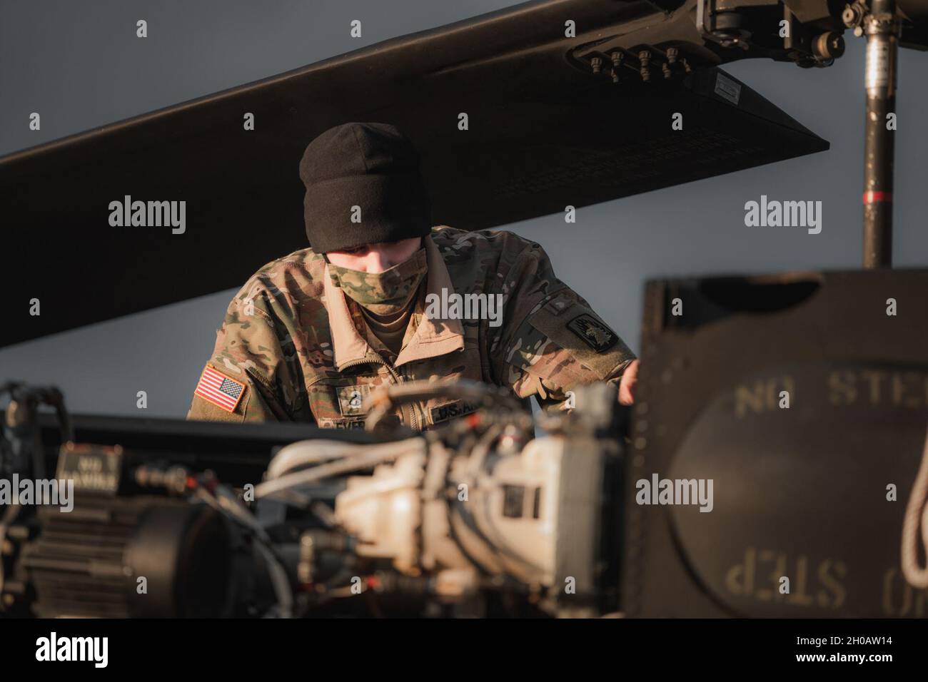 Pvt. 1st Class Kevin Everly, a UH-60 crewmember assigned to the 12th ...