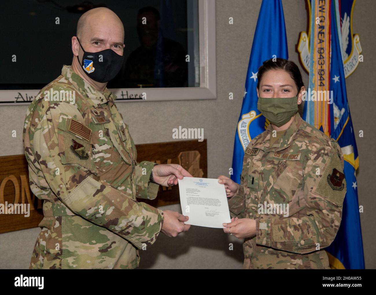 1st Lt. Taylor Foerstner, right, 54th Operations Support Squadron ...