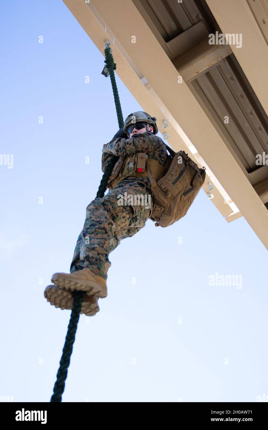 U.S. Marine Corps Sgt. Sheldon Adam, a squad leader with Bravo Company ...