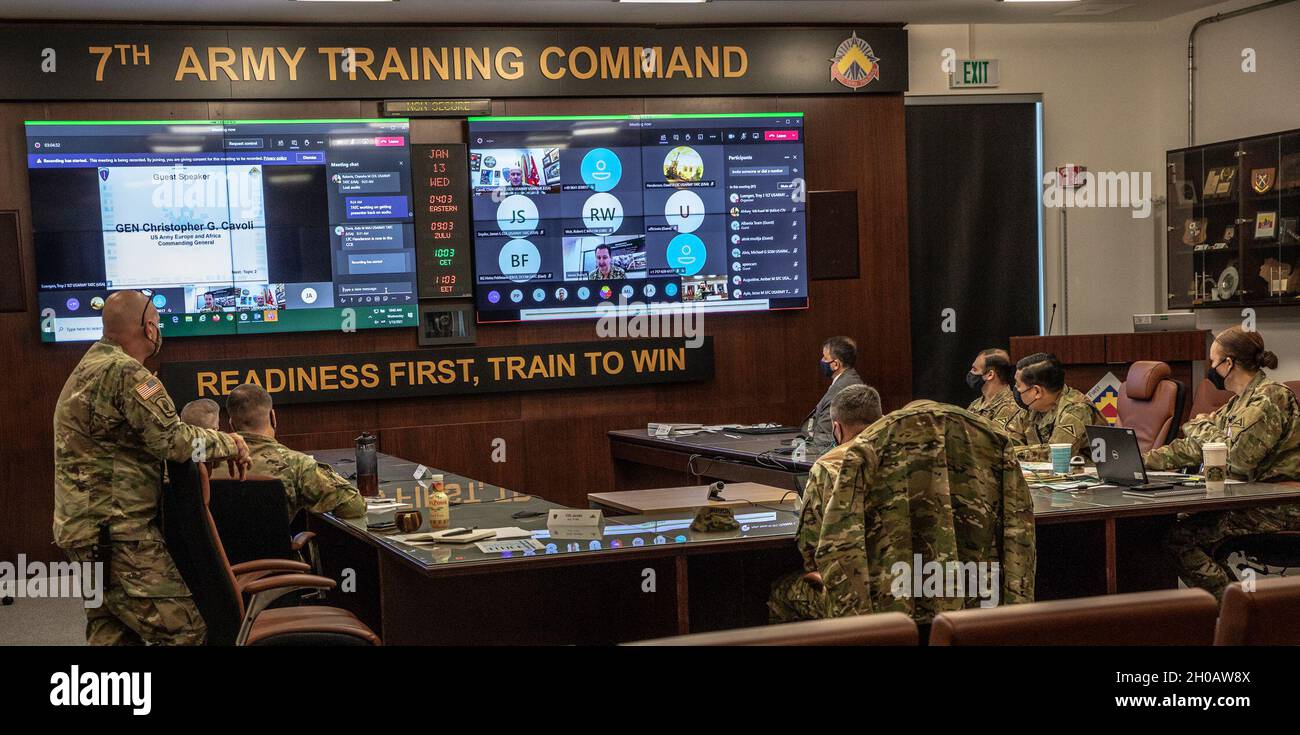 U.S. Army Brig. Gen. Christopher Norrie, middle, commander of the 7th ...