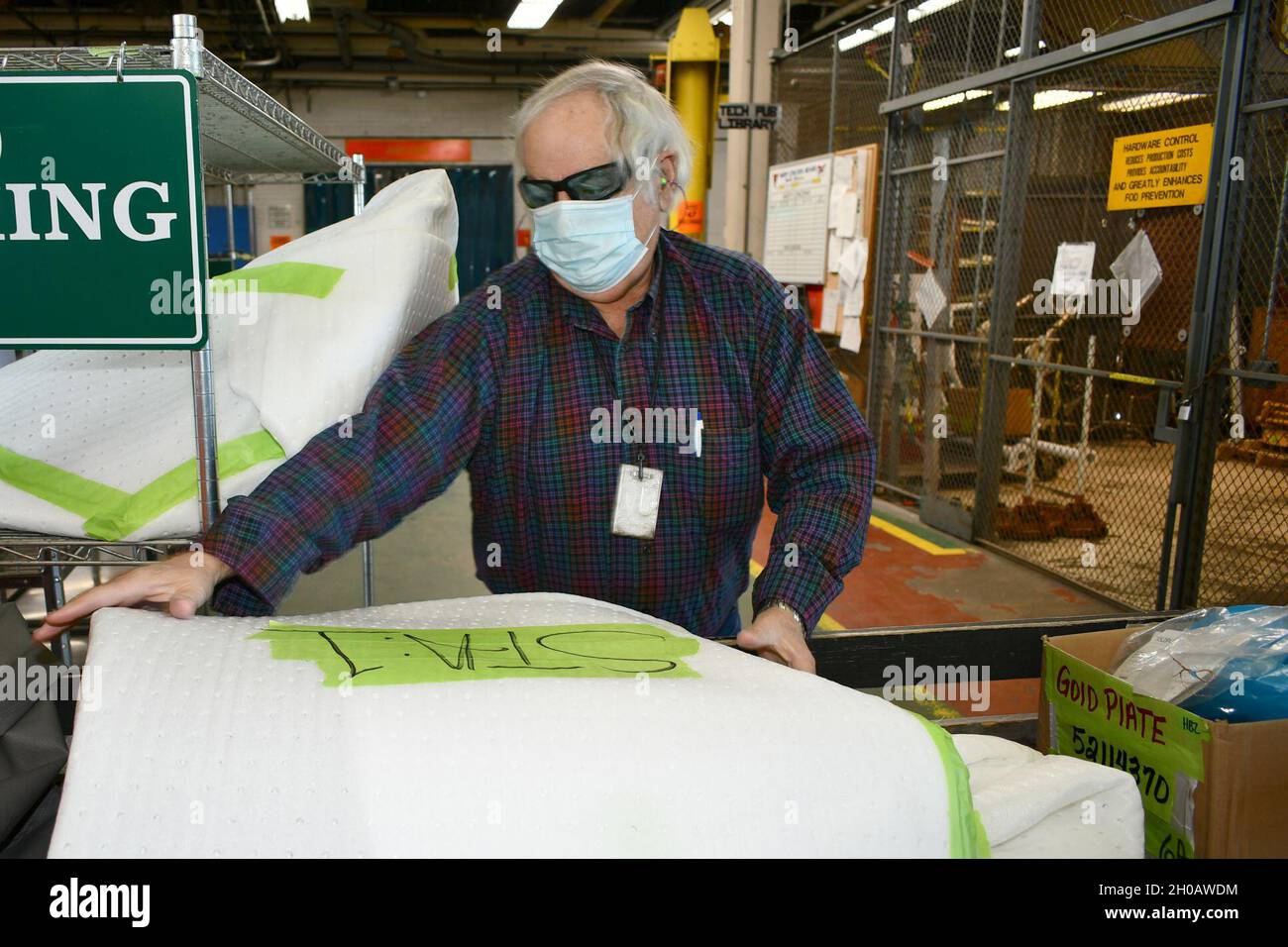 Lester Cannon, mule train driver, delivers parts between aircraft ...