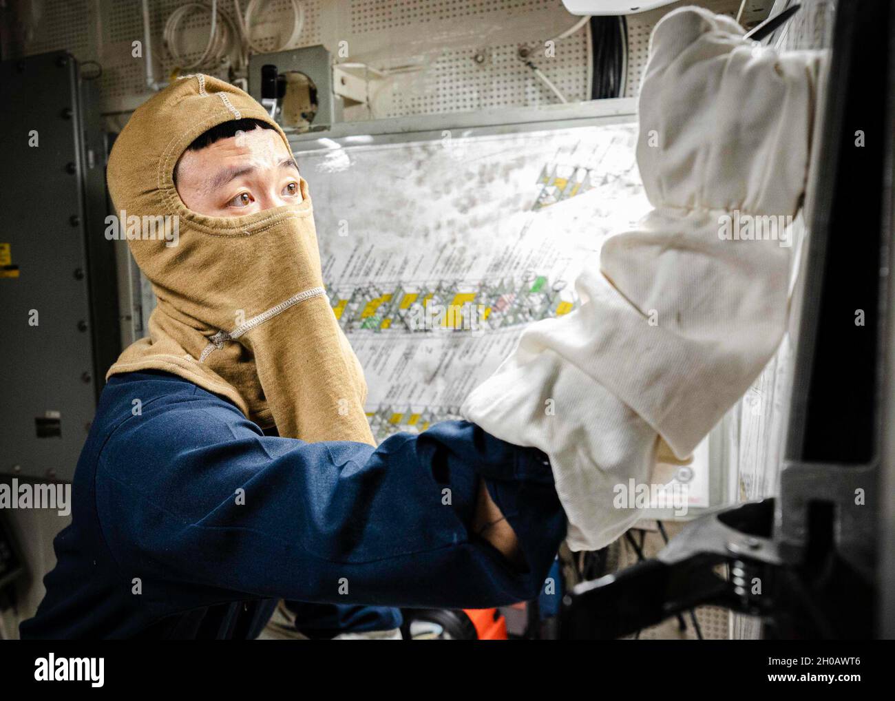 Ensign Yibo Wang, from Chula Vista, Calif., charts zone-setting and ...