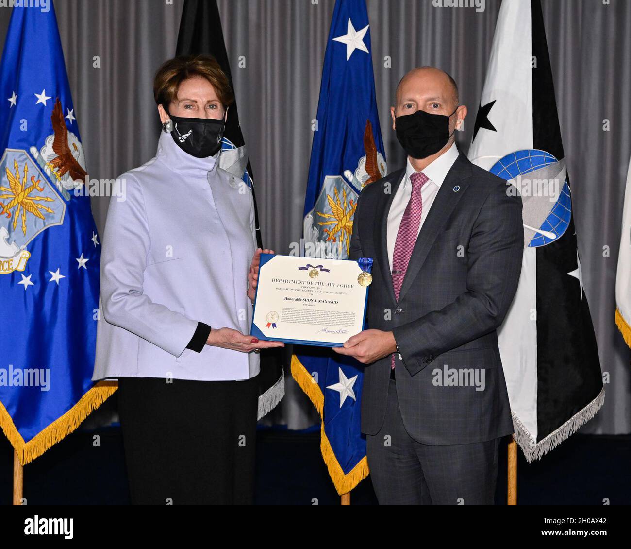 Secretary of the Air Force Barbara M. Barrett poses with Shon Manasco ...