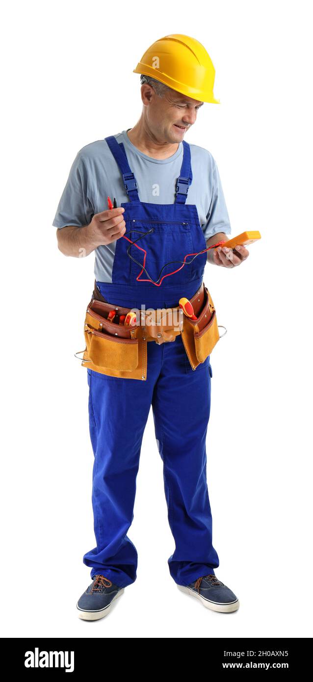 Electrician with multimeter wearing uniform on white background Stock ...