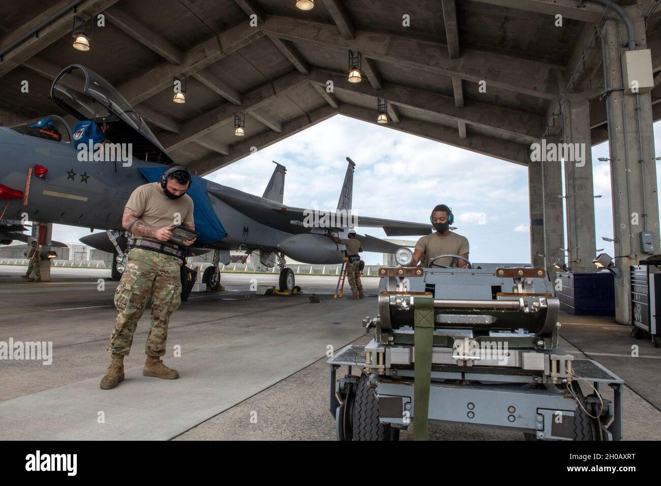 U.S. Air Force load crew members from the 44th Aircraft Maintenance ...