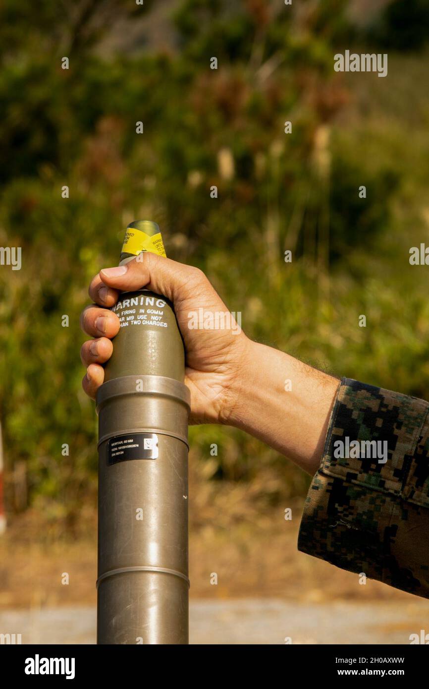 U.S. Marine Corps Cpl. Donovan Hage, a mortarman with Tactical ...