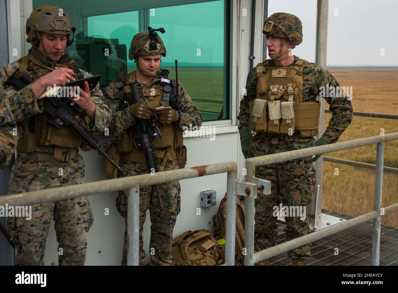 U.S. Marine Corps Col. Brian Russell, right, commanding officer of II ...