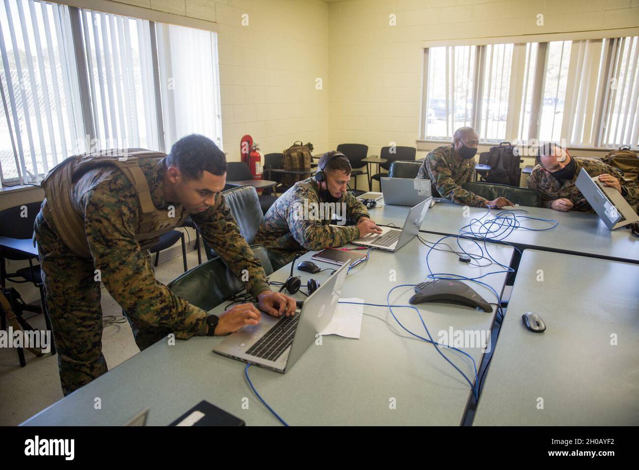 U.S. Marines with 2nd Marine Expeditionary Brigade (2nd MEB) setup a ...