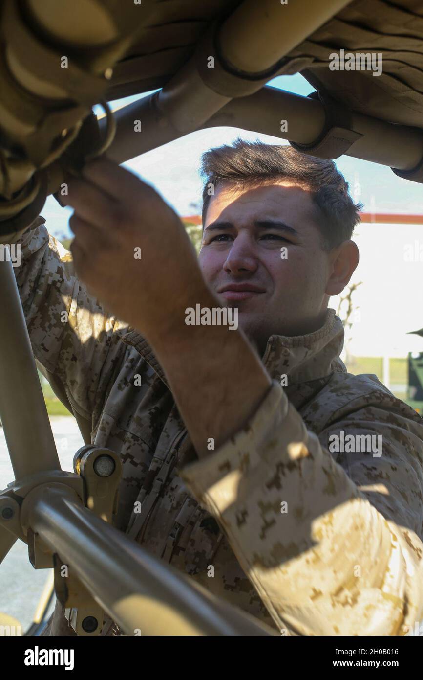 U.S. Marine Cpl. Hunter R. Varner, a radio operator with 31st Marine ...