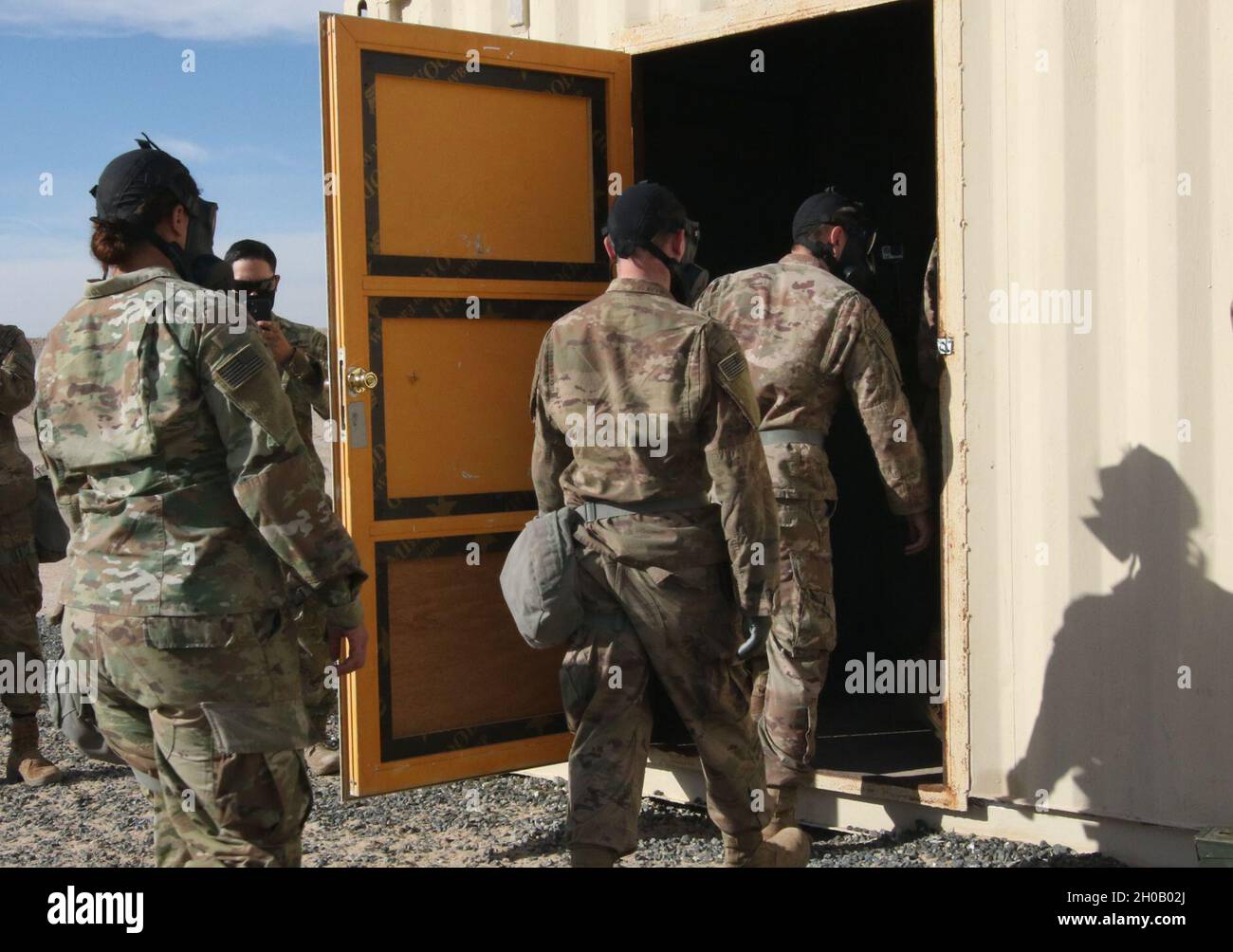 Soldiers with the 40th Brigade Engineer Battalion enter a CS gas ...