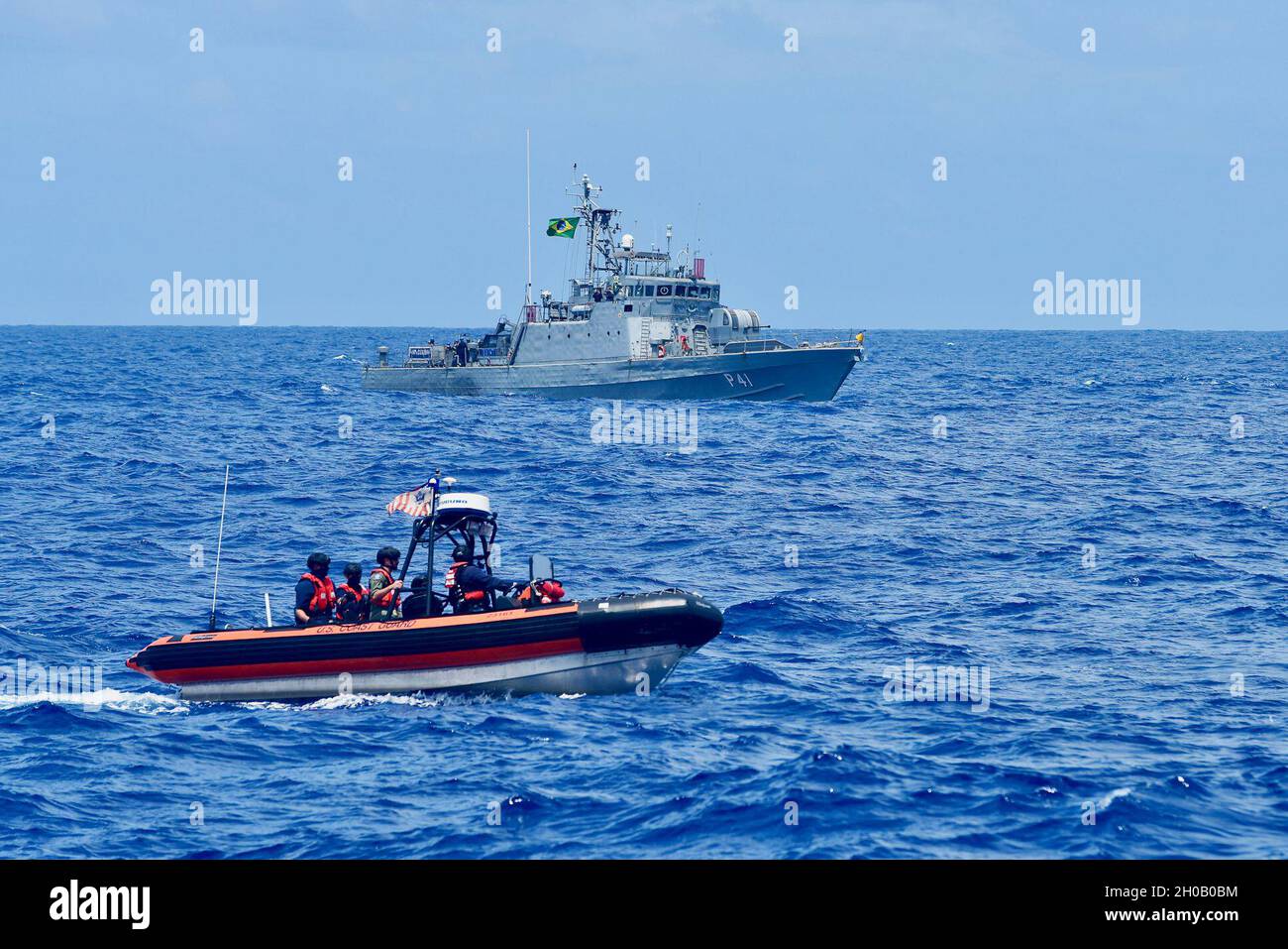 A small boat crew from the USCGC Stone (WMSL 758) drives alongside the ...
