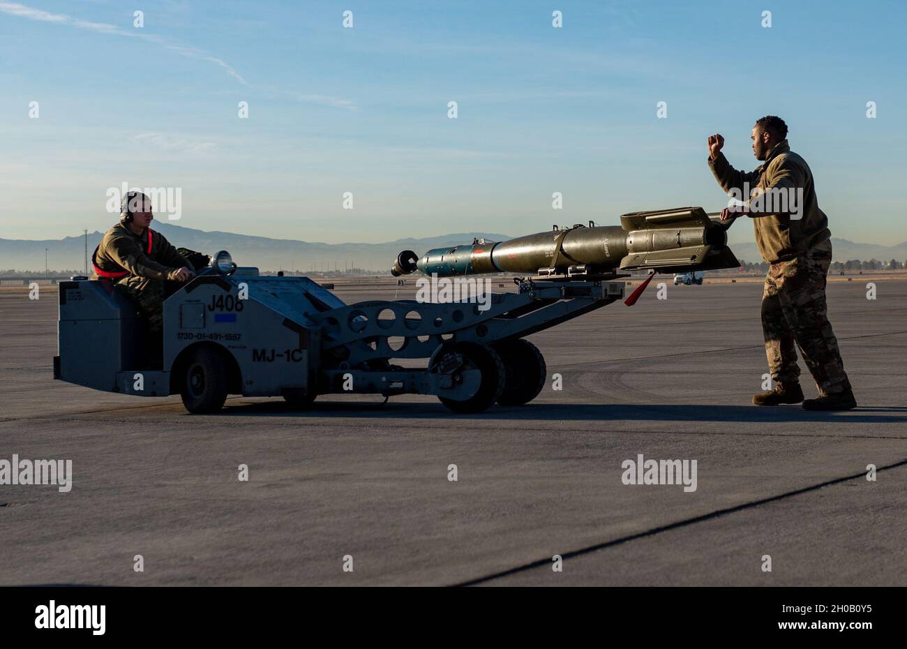 Weapons loaders from the 57th Maintenance Squadron compete in a load ...