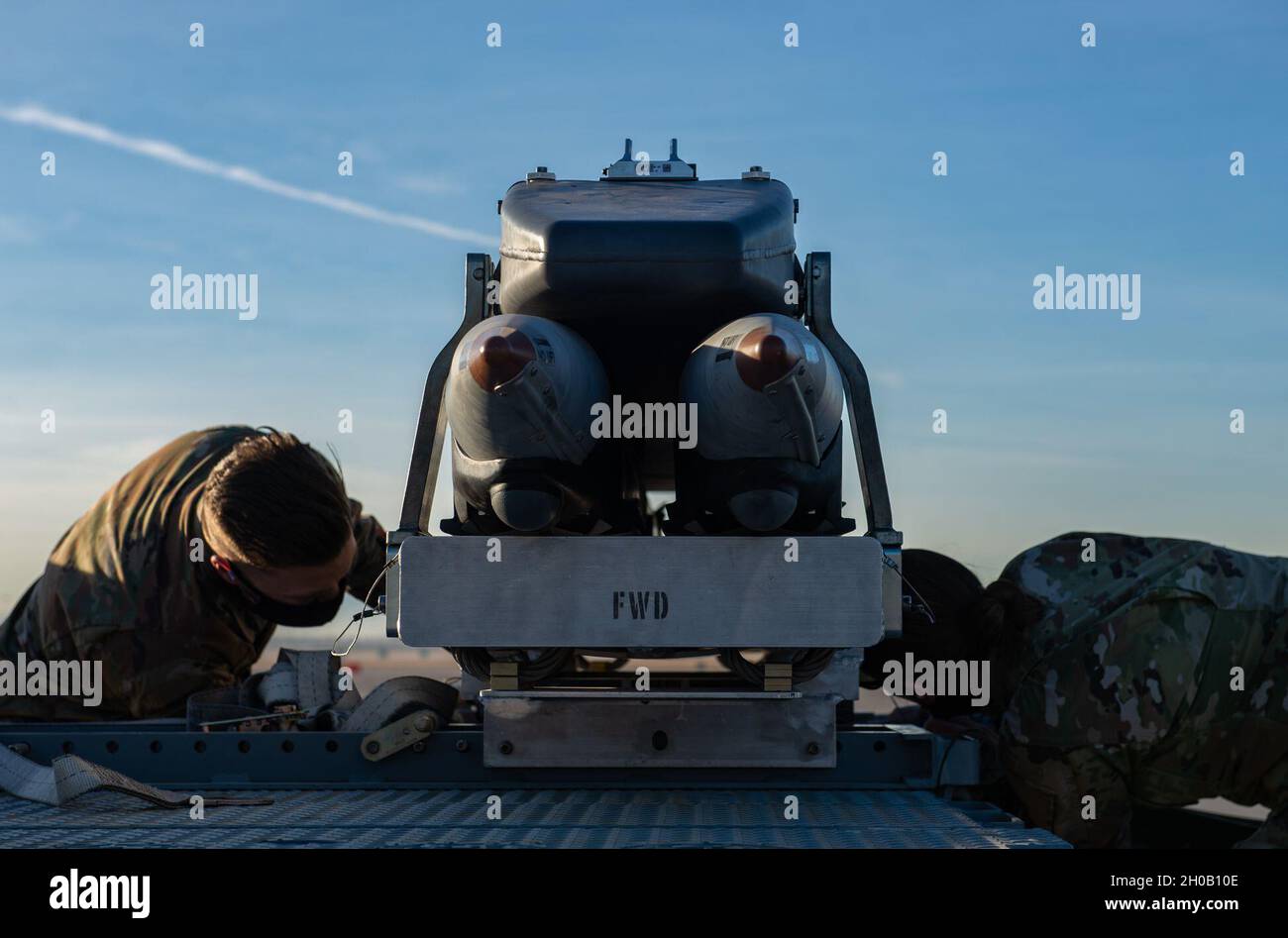 A Weapons loader from the 57th Maintenance Squadron completes a safety ...