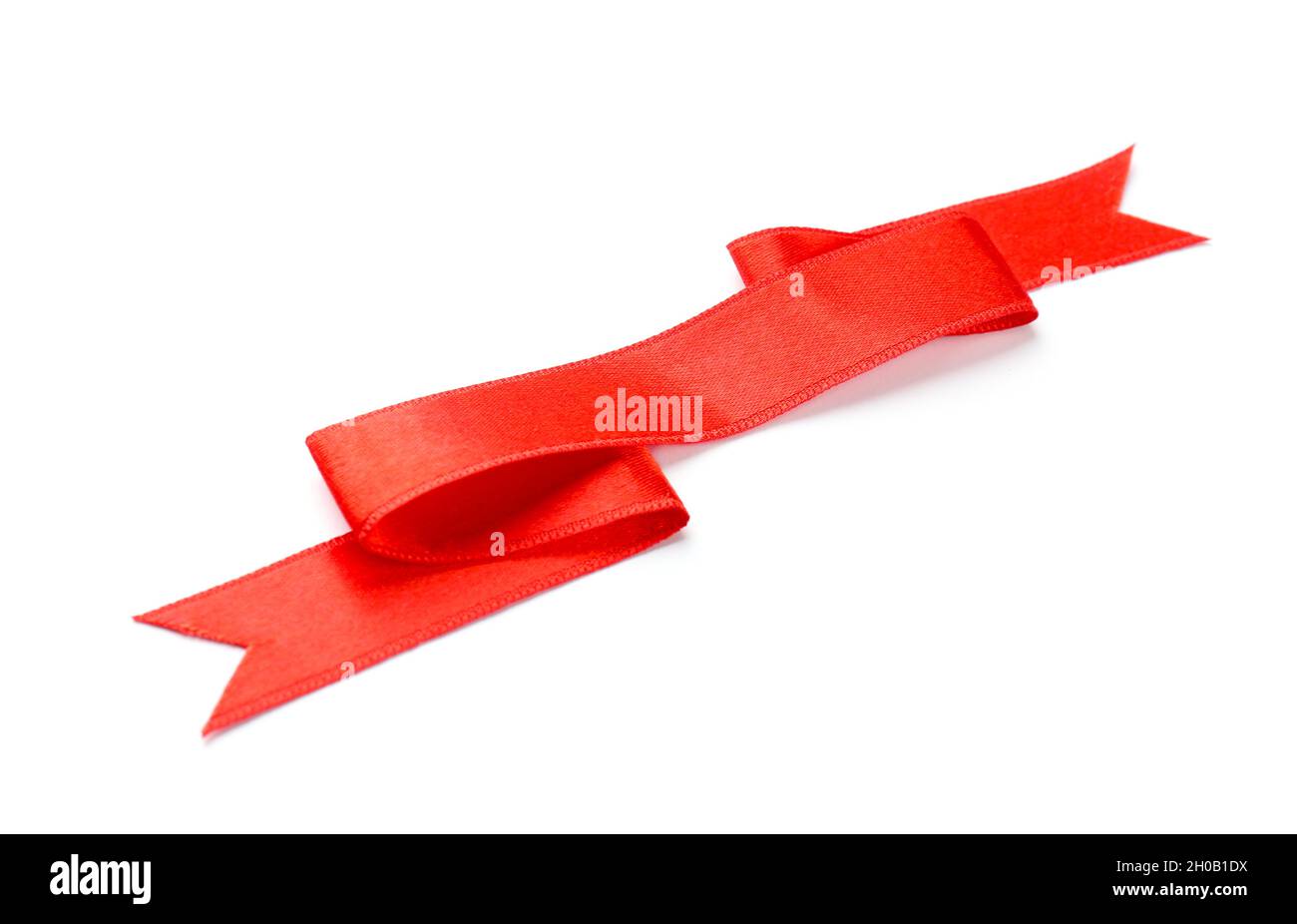 Simple red ribbon on white background. Festive decoration Stock Photo ...