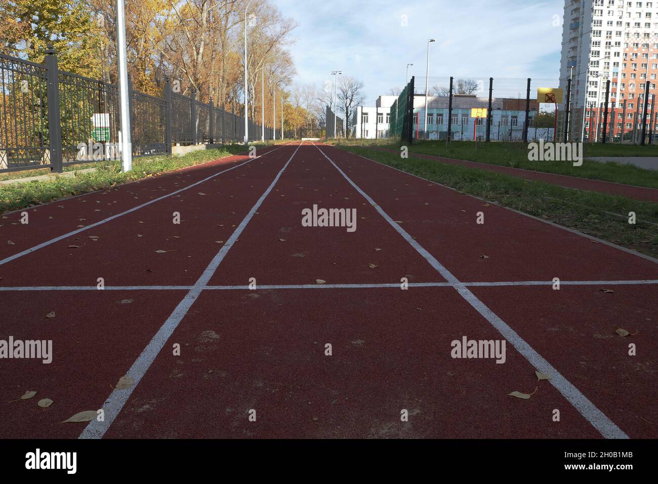 Running track at the stadium on the street Stock Photo - Alamy