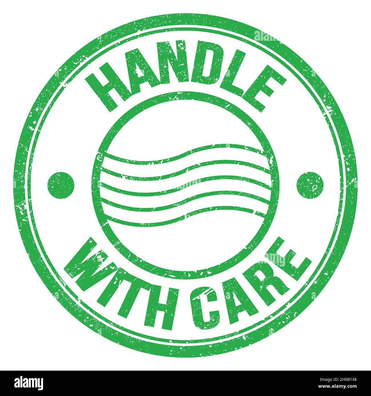 HANDLE WITH CARE text written on green round postal stamp sign Stock ...