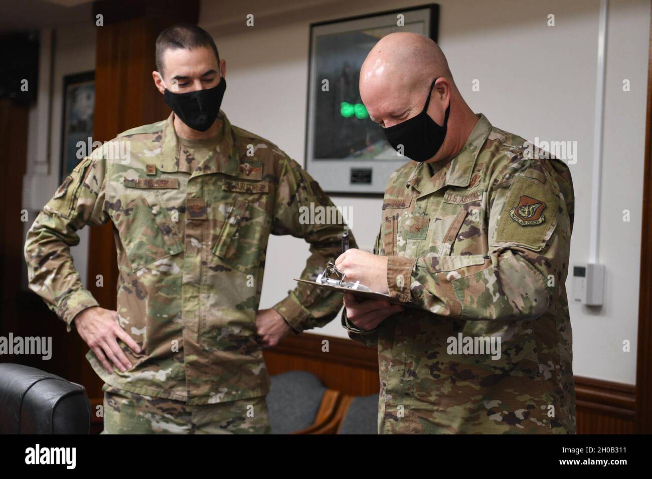 U.S. Air Force Brig. Gen. Joel Carey, the 18th Wing commander, fills ...